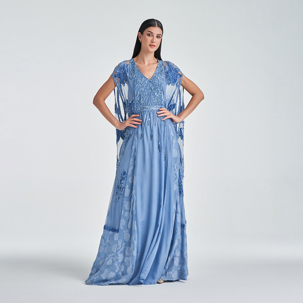A Long Hand-Embroidered Sky Blue Dress by Shalky.